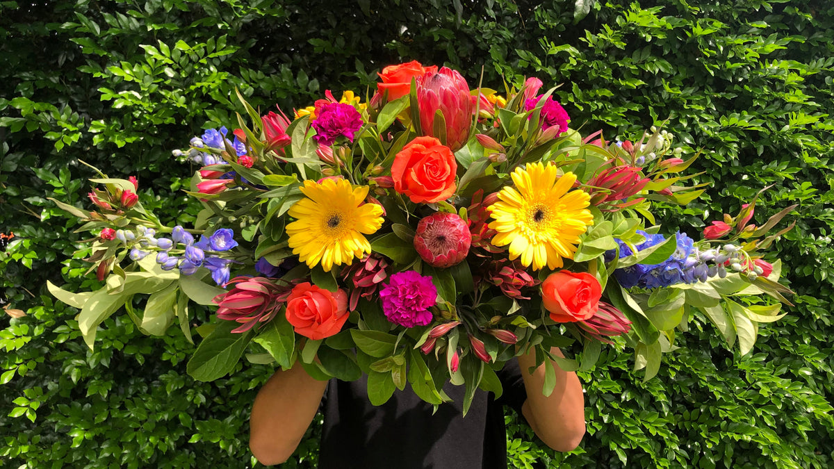 BRIGHT CASKET SPRAY - Northside Flower Market